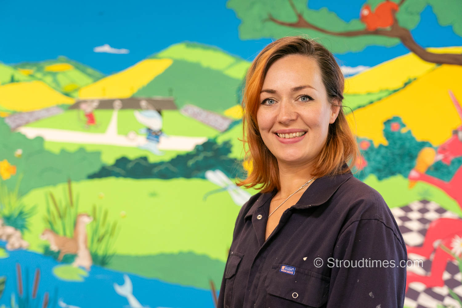 Back of the net! Kat completes mural ahead of new football season ...